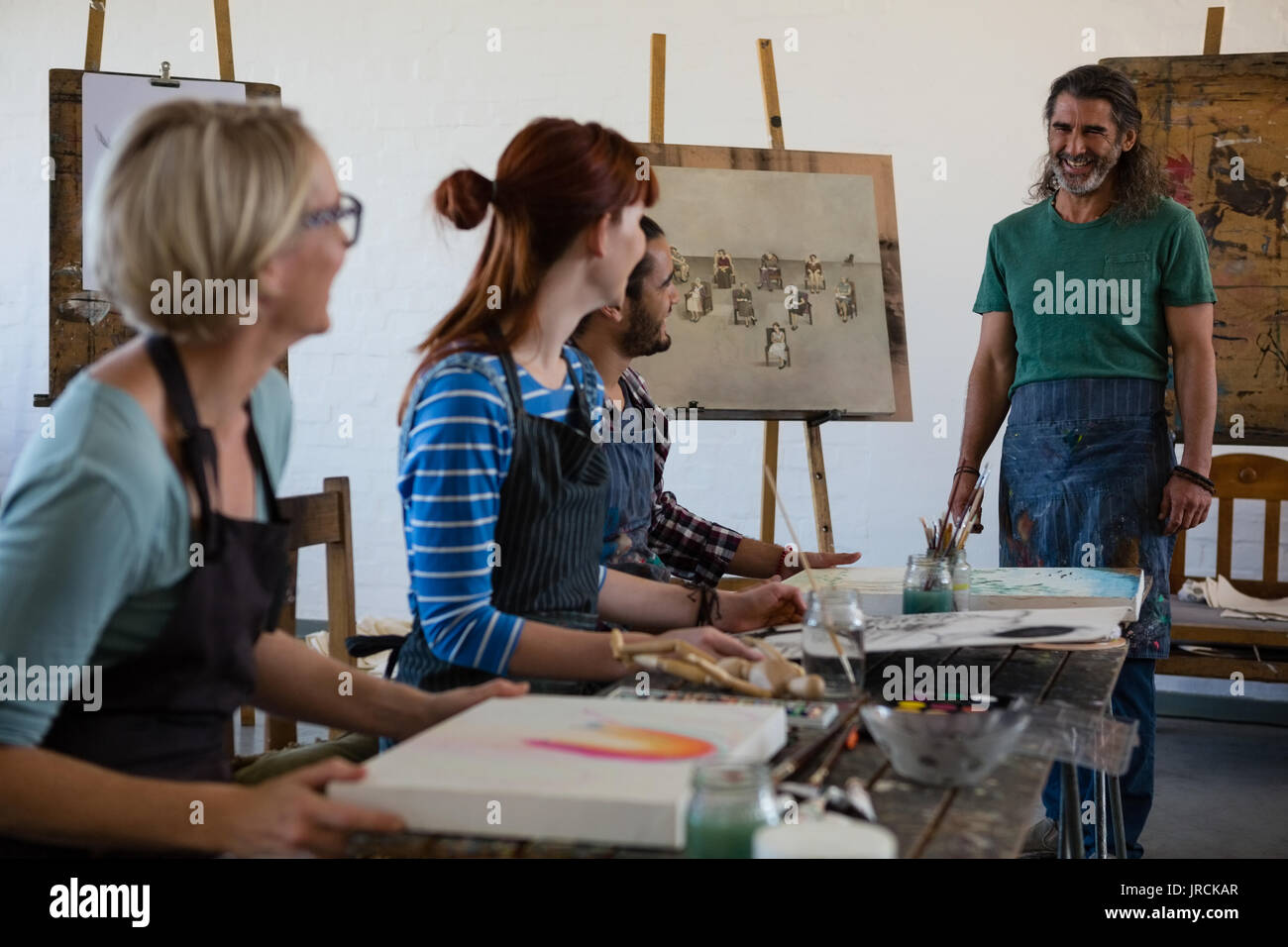 Happy teacher hi-res stock photography and images - Alamy