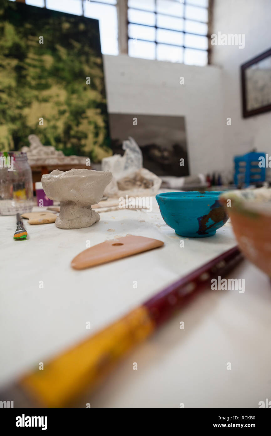 Painting equipment on table in drawing class Stock Photo - Alamy