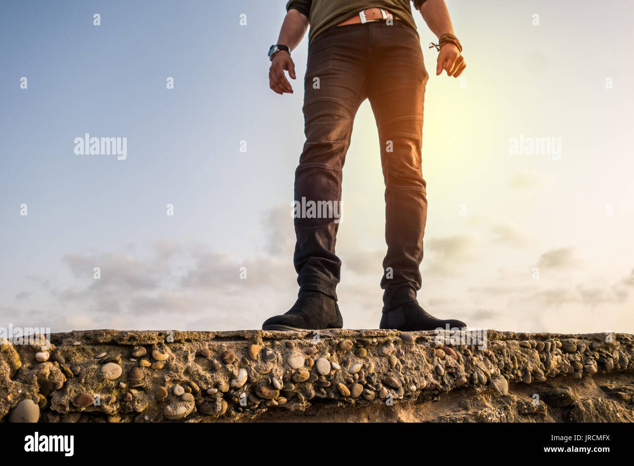 Man standing on the wall hi-res stock photography and images - Alamy