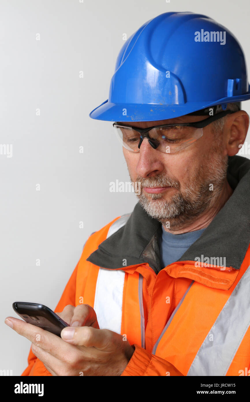 Engineer in orange hard hat hi-res stock photography and images - Alamy