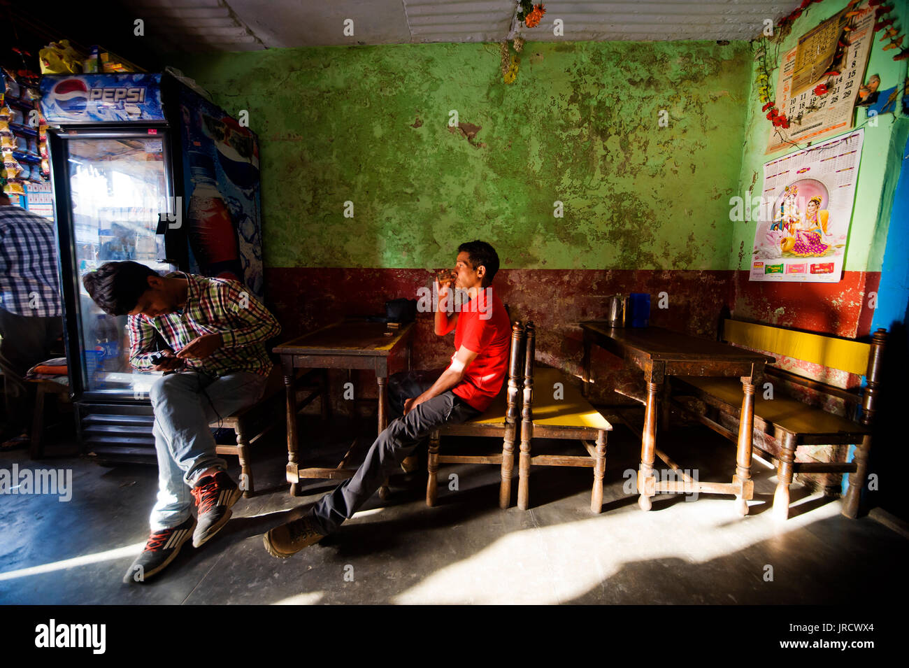 Indian men on a typical tea shop in Champawatt town, Uttarakhand, India ...