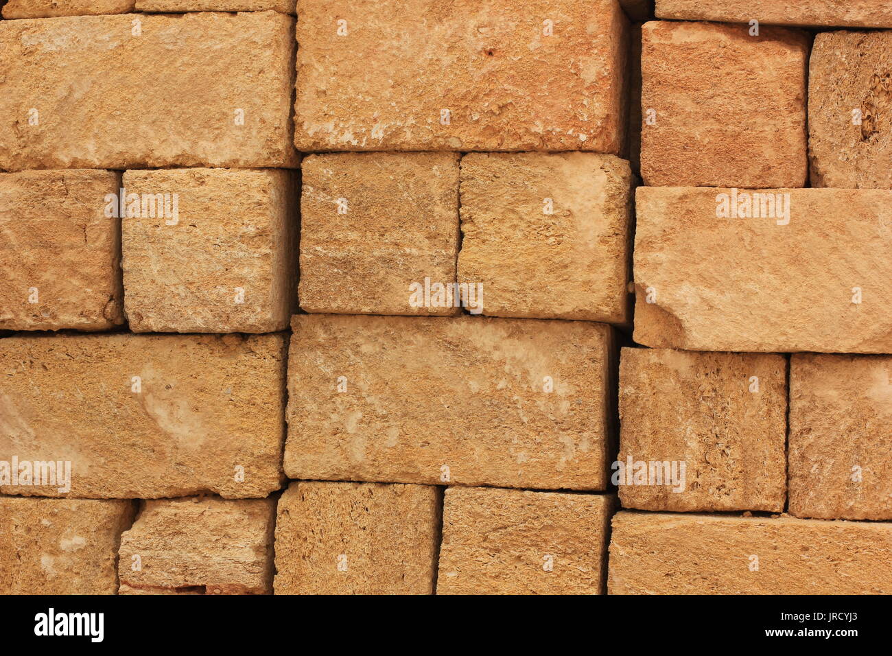 Stacked bricks background Stock Photo - Alamy