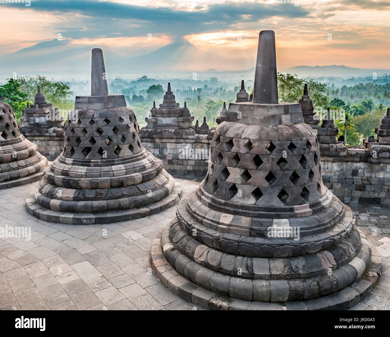 Temple complex Borobudur at sunrise, Stupas, cloudy sky, Borobudur ...