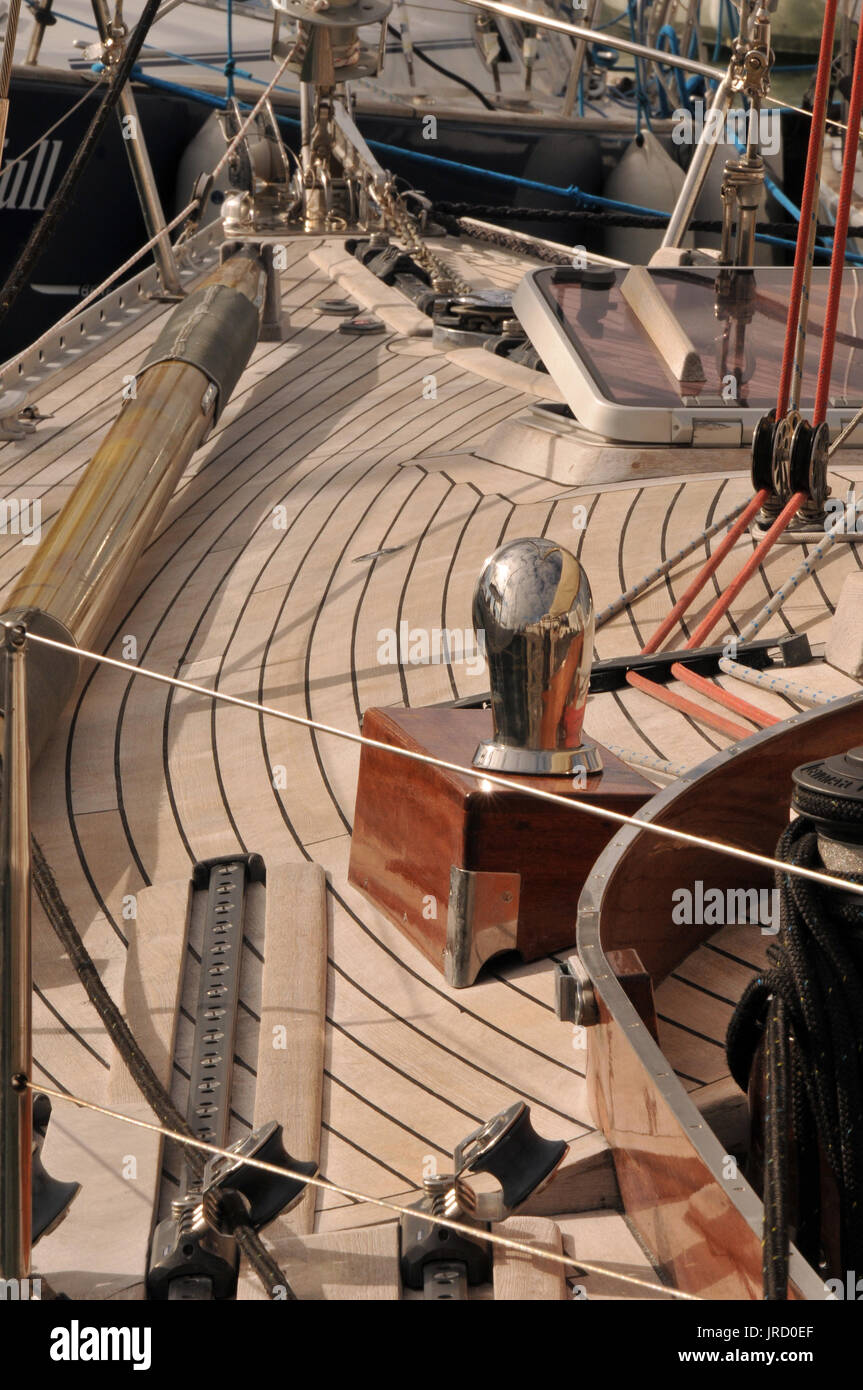 The beautifully laid and caulked wooden deck of a large traditional ...