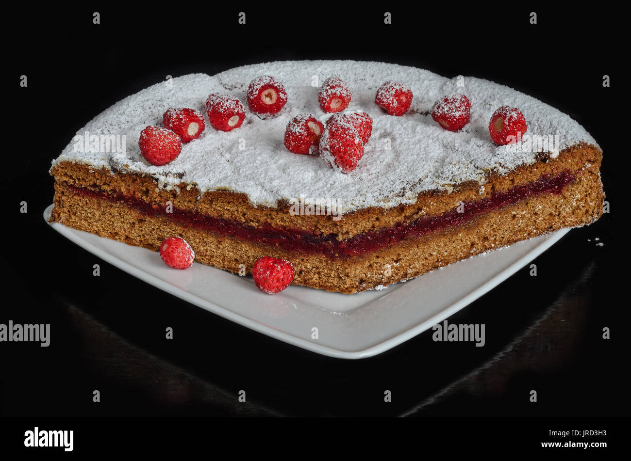 Gingerbread with Strawberry Jam Stock Photo - Alamy