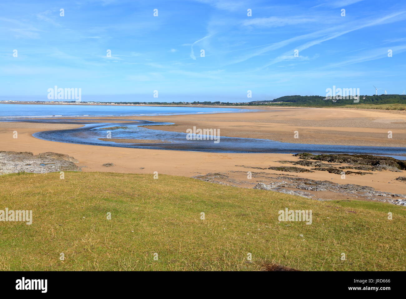 The meandering river Ogmore at the point at which it enters the sea in ...