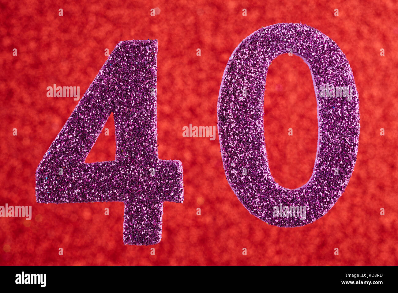 Number forty purple color over a red background. Anniversary ...