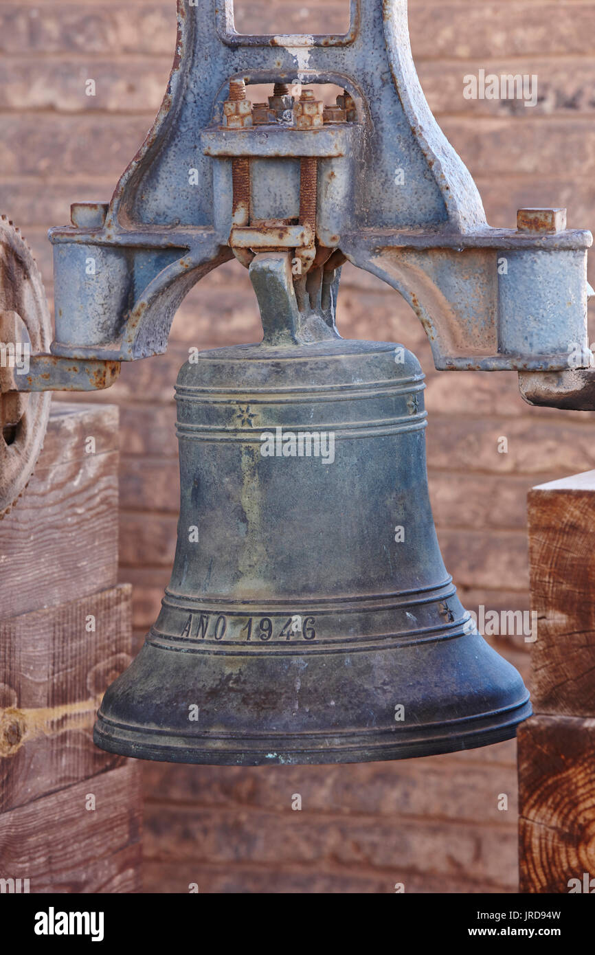 Antique bronze bell with mechanism on a bell tower. Vertical Stock ...