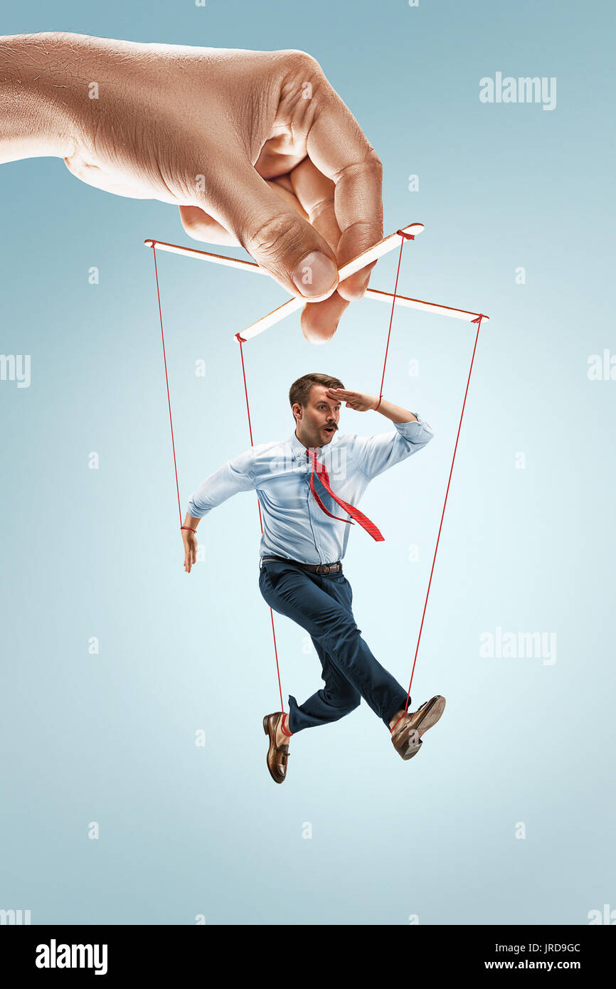 Puppet master hand hi-res stock photography and images - Alamy