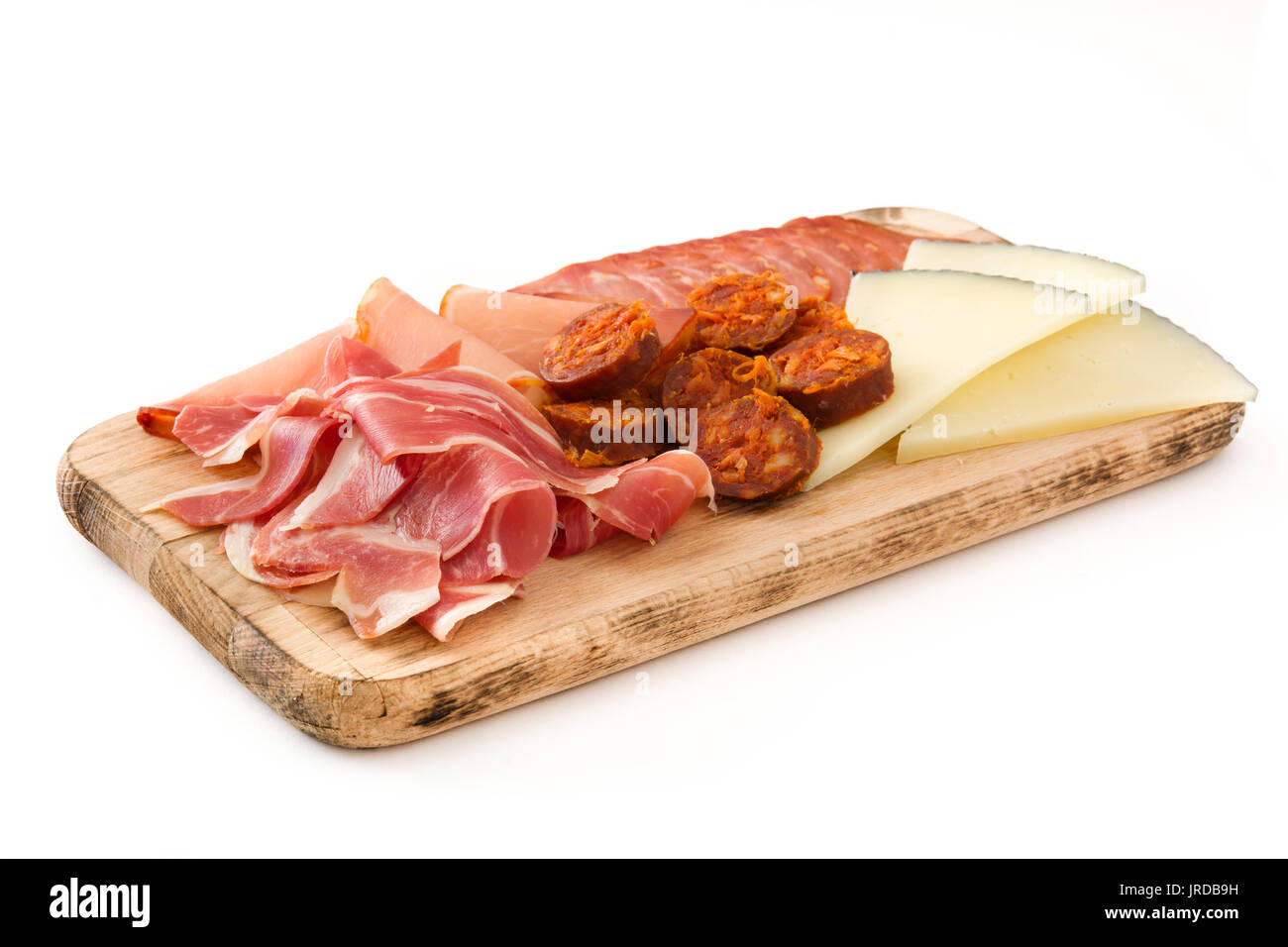 Spanish cold cuts (embutidos). Cheese, sausage and ham isolated on ...