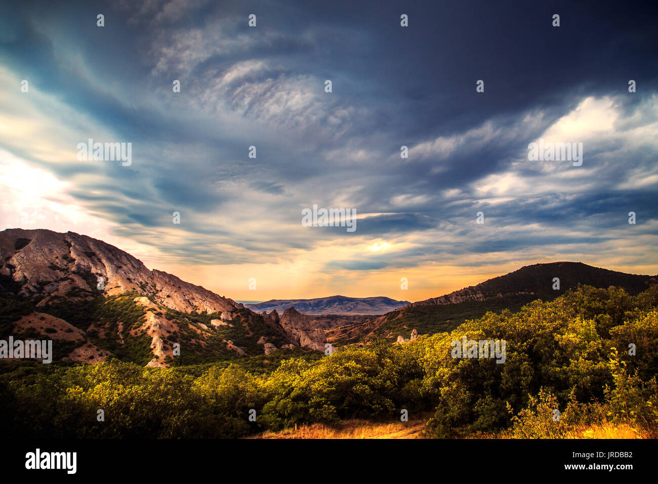 Amazing mountain landscape with dramatic stormy sky Stock Photo - Alamy