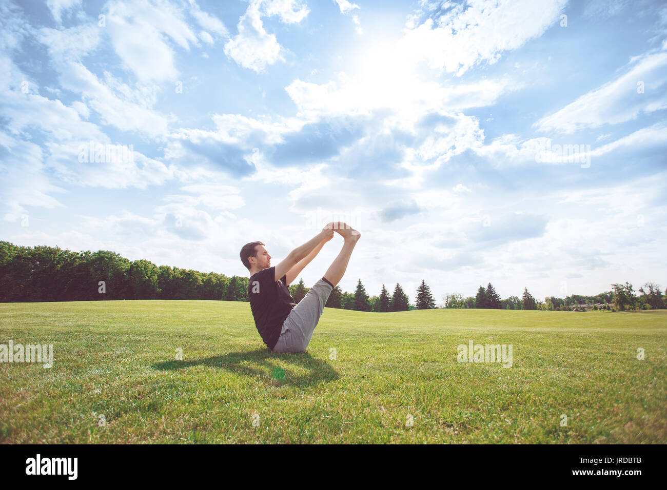 Man practice yoga hi-res stock photography and images - Alamy