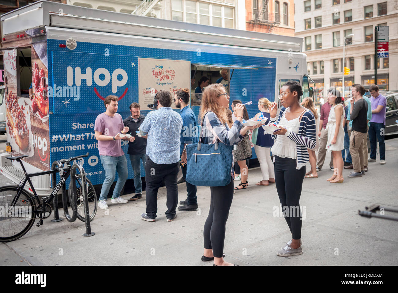 Hungry foodies line up at an IHOP branded food truck in the Flatiron ...
