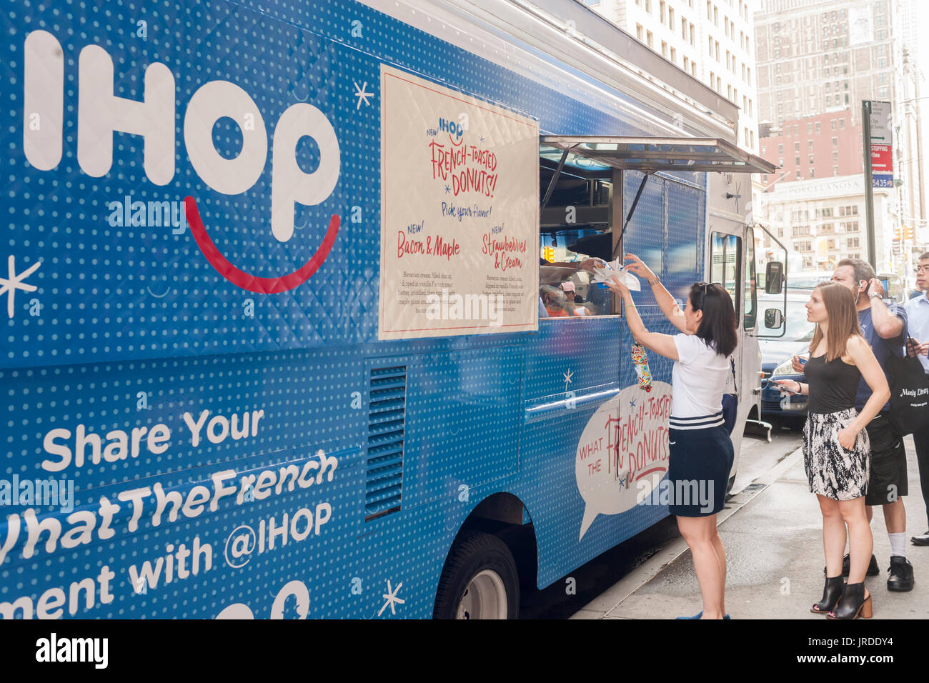 Hungry foodies line up at an IHOP branded food truck in the Flatiron ...