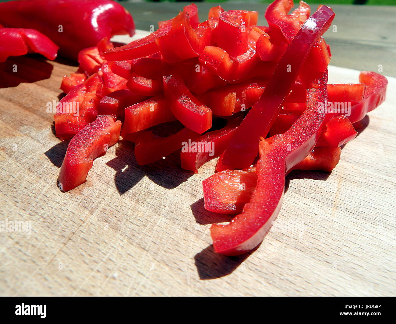Red sweet pepper, Sliced red pepper Stock Photo - Alamy