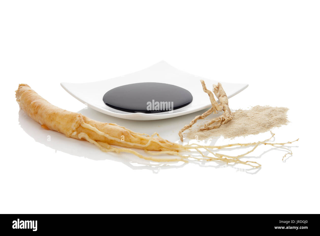 Pure ginseng powder and extract with ginseng root, isolated on white ...