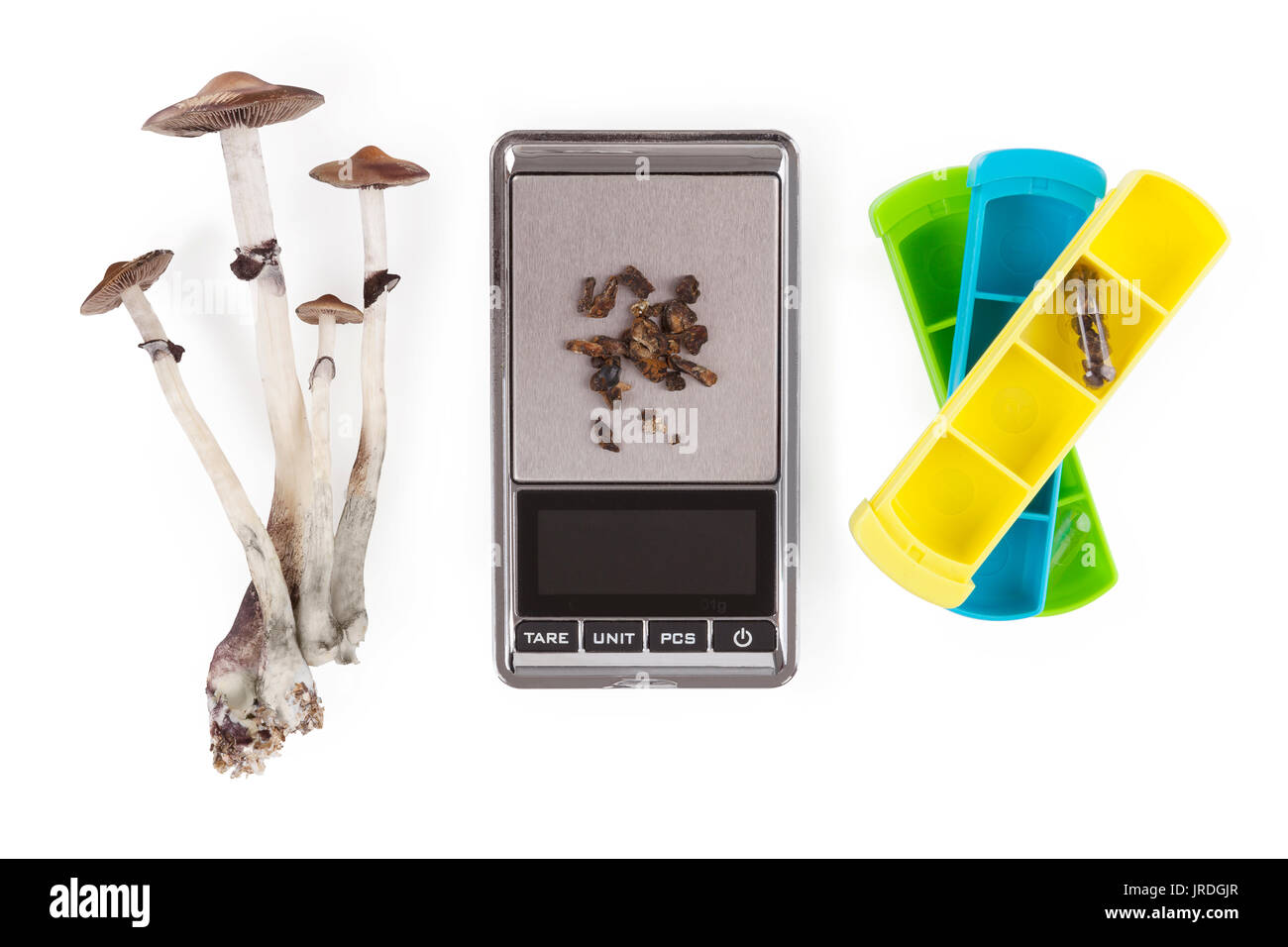 Magic mushrooms medicine, microdosing, pillbox, digital scale, isolated ...