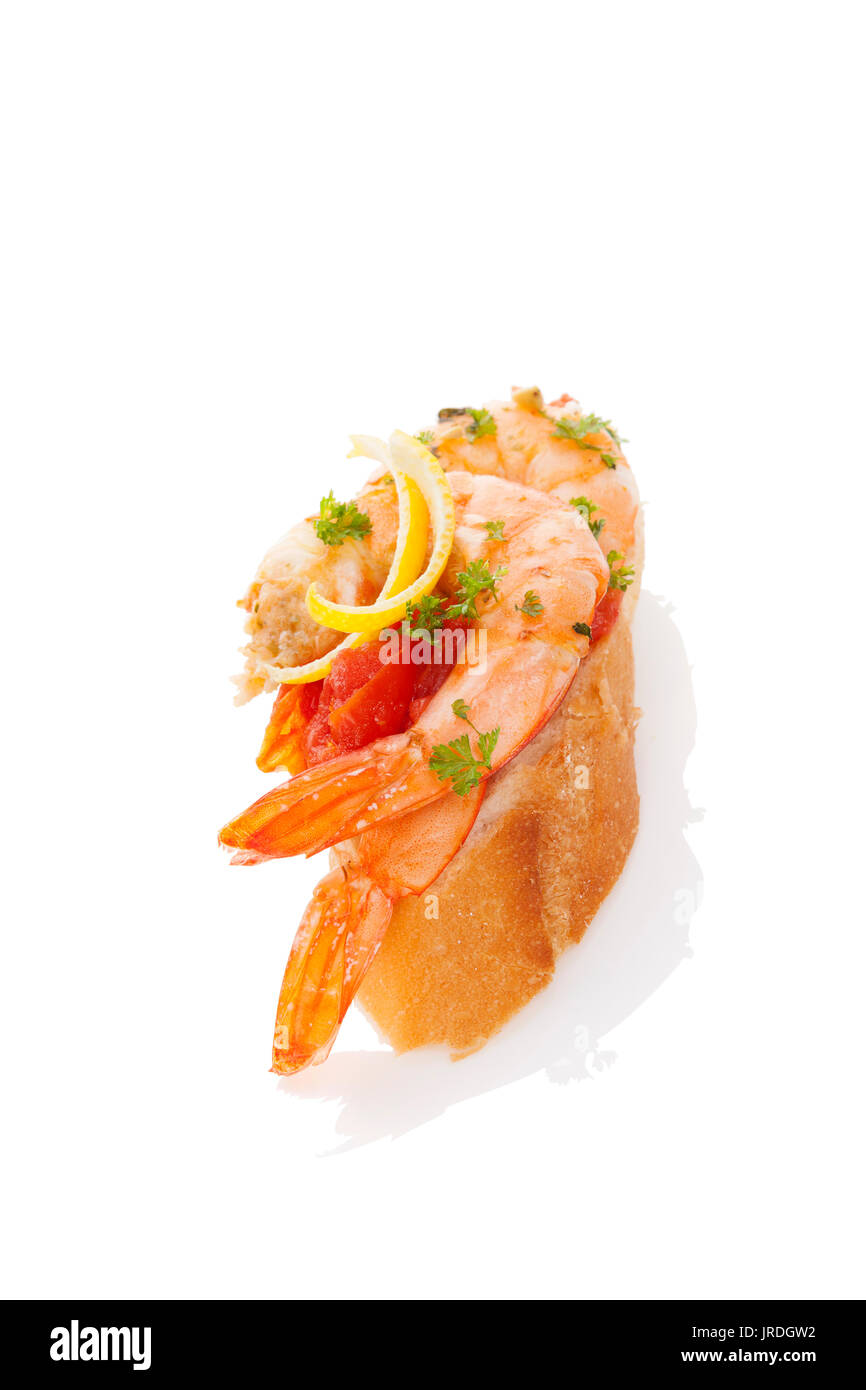 Delicious prawn snack on baguette, isolated on white background ...