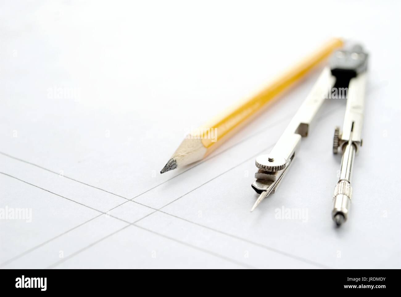 compasses for drawing on the table Stock Photo - Alamy