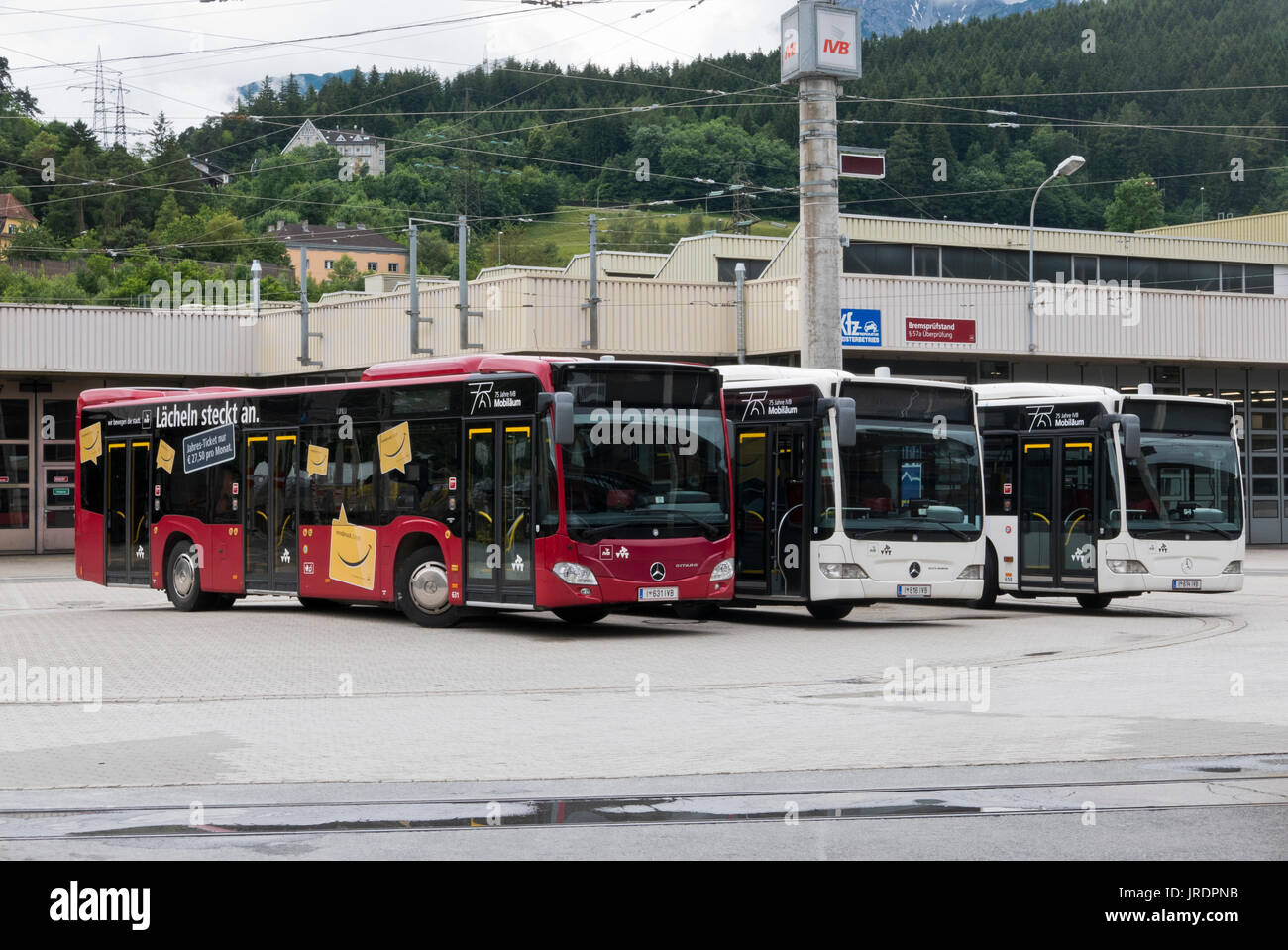 Buses at depot, Innsbruck, austria Stock Photo - Alamy