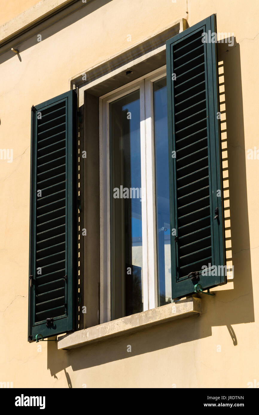 Window in Florence, Italy with shutters Stock Photo - Alamy