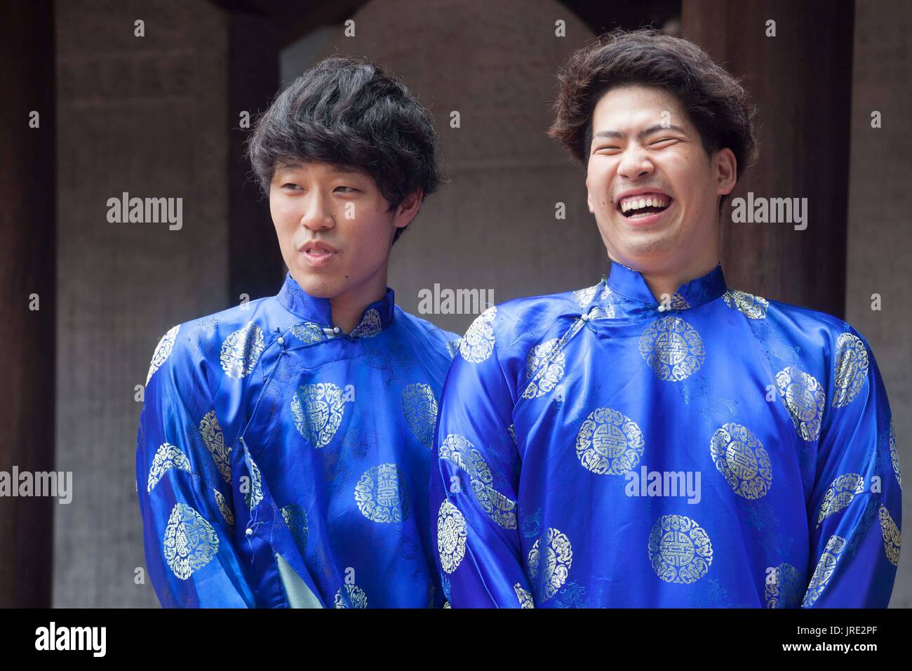 Happy Young men together Stock Photo - Alamy