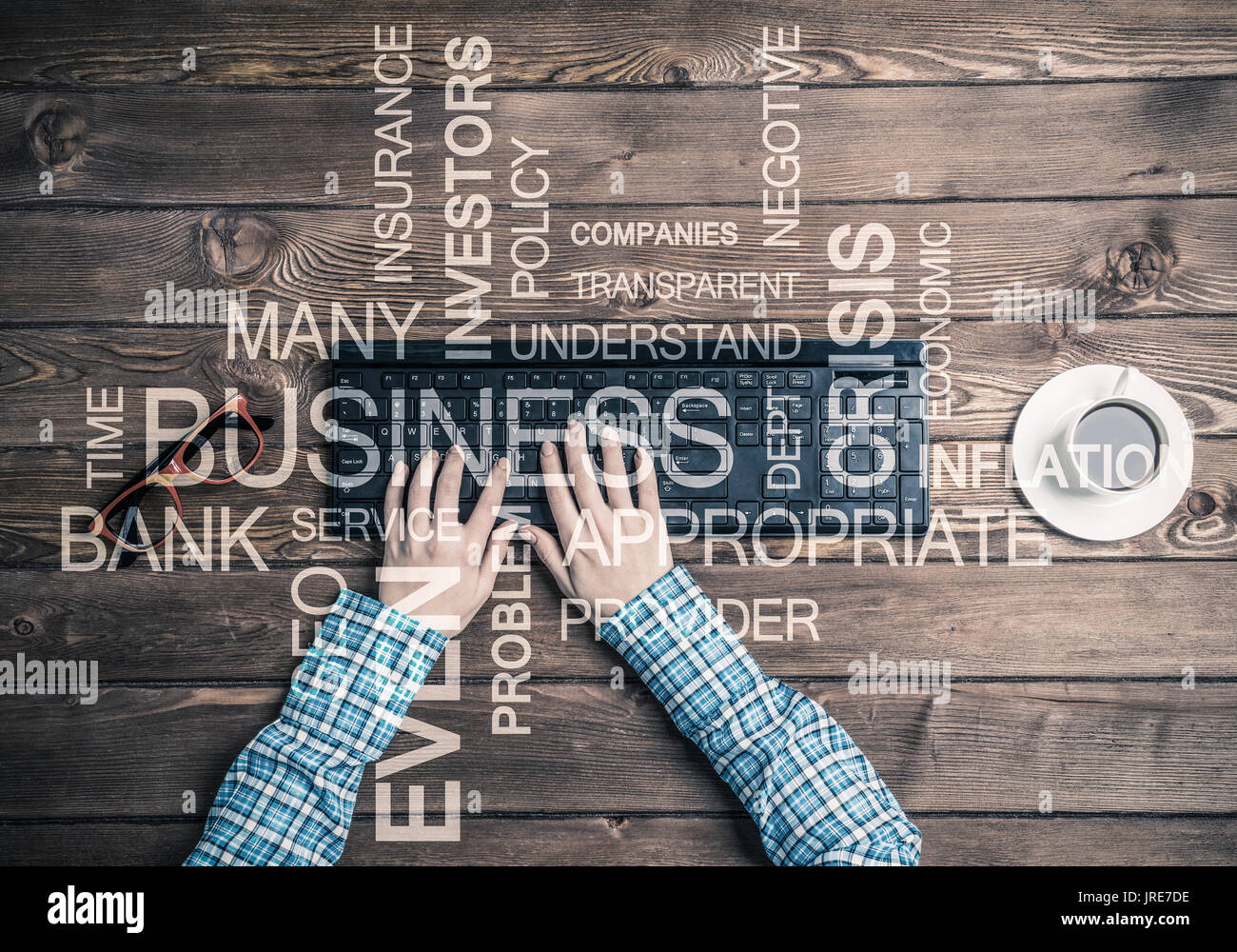 Business workplace with keyboard and business conceptual words Stock ...