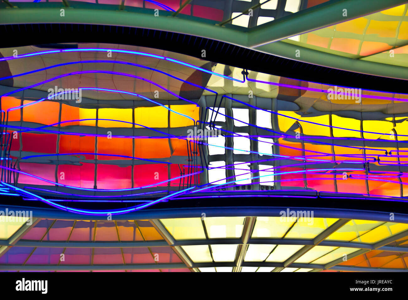 Brilliant neon lights and panels illuminate the Chicago O'Hare airport ...
