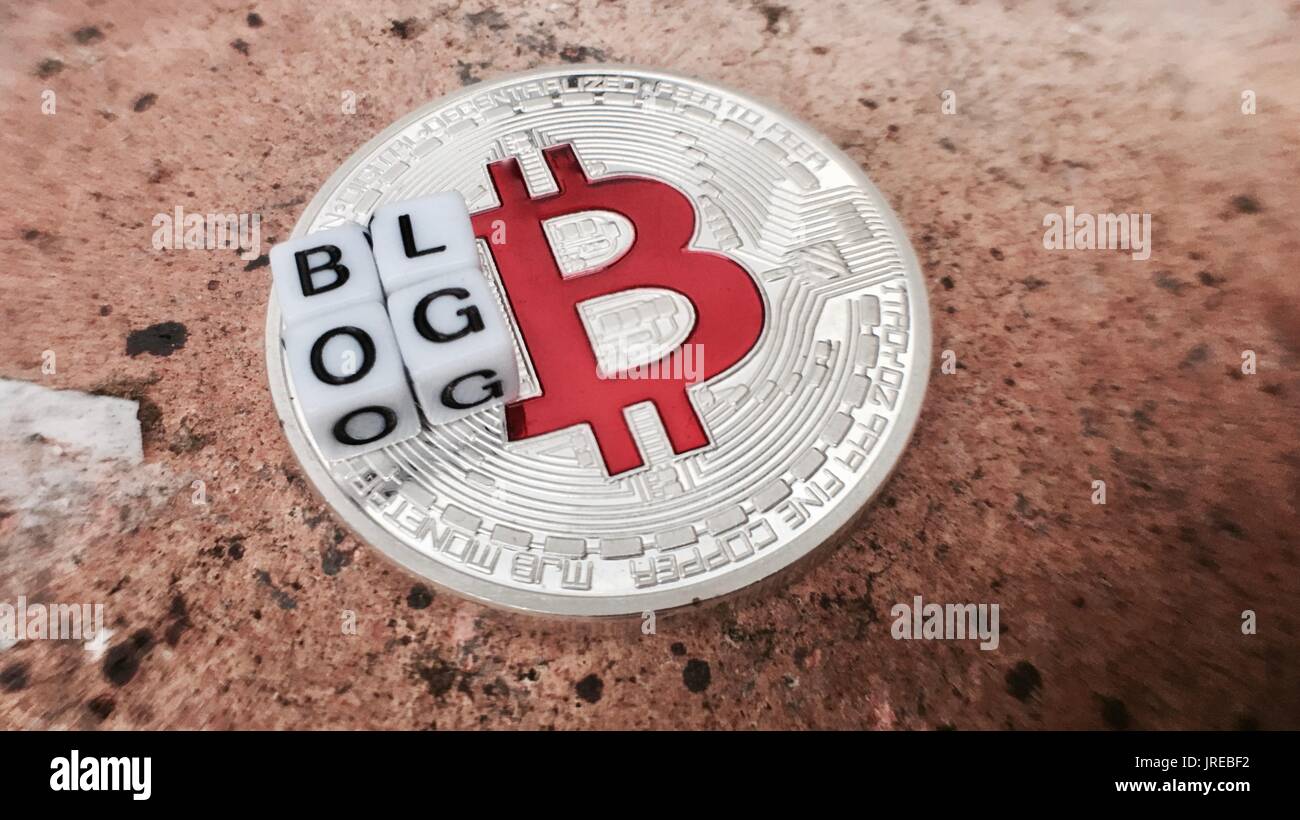 Digital currency physical metal bitcoin coin with white square letters ...