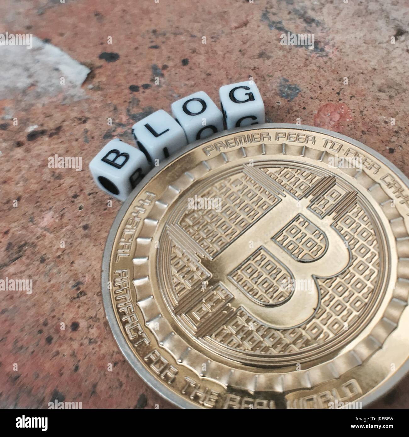 Digital currency physical metal bitcoin coin with white square letters ...