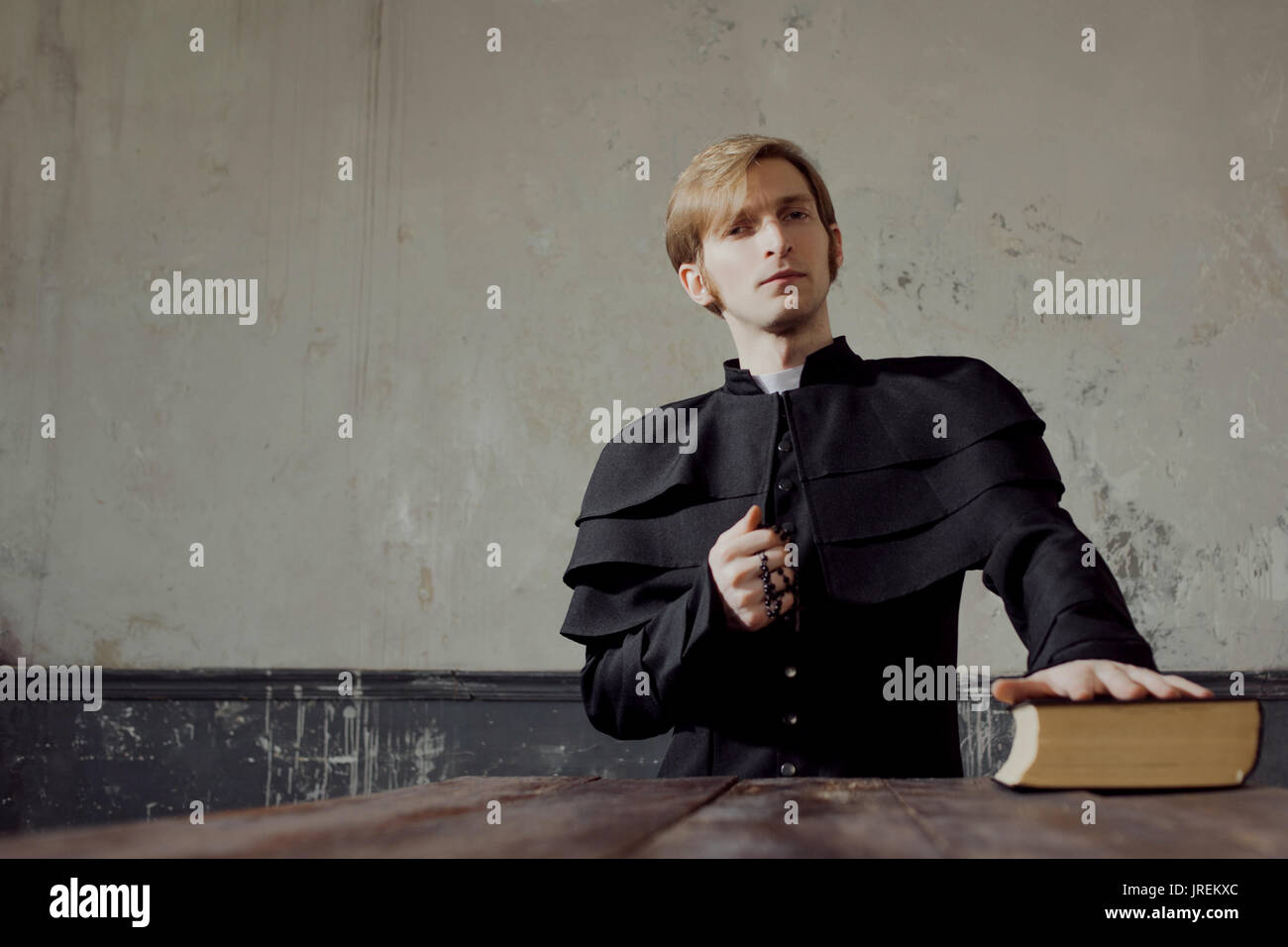 Handsome priest hi-res stock photography and images - Alamy
