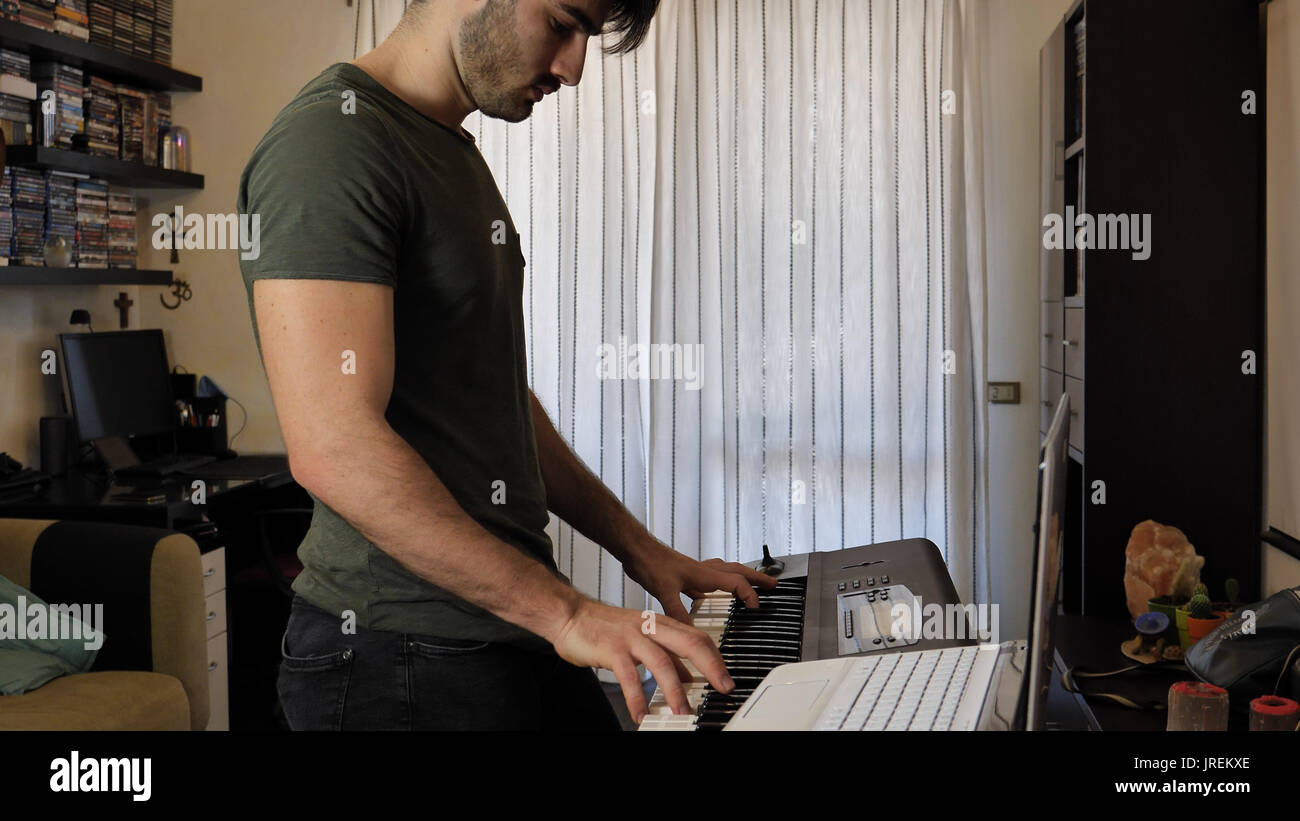 Play instrument modern home hi-res stock photography and images - Alamy