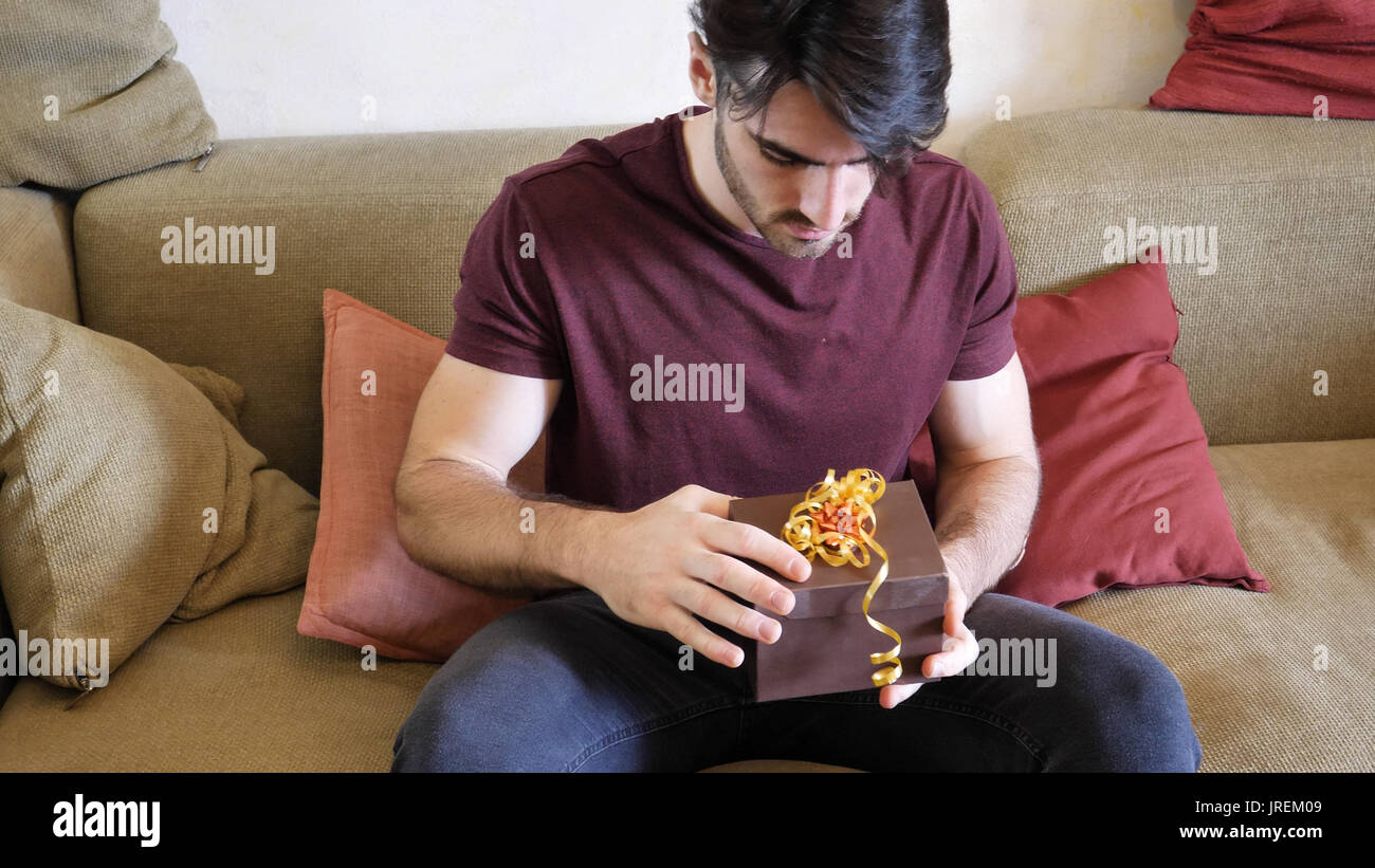 Surprised man present hi-res stock photography and images - Alamy