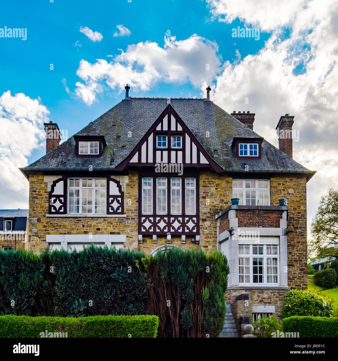 Beautiful old house with garden in Belgium, sunset time Stock Photo - Alamy