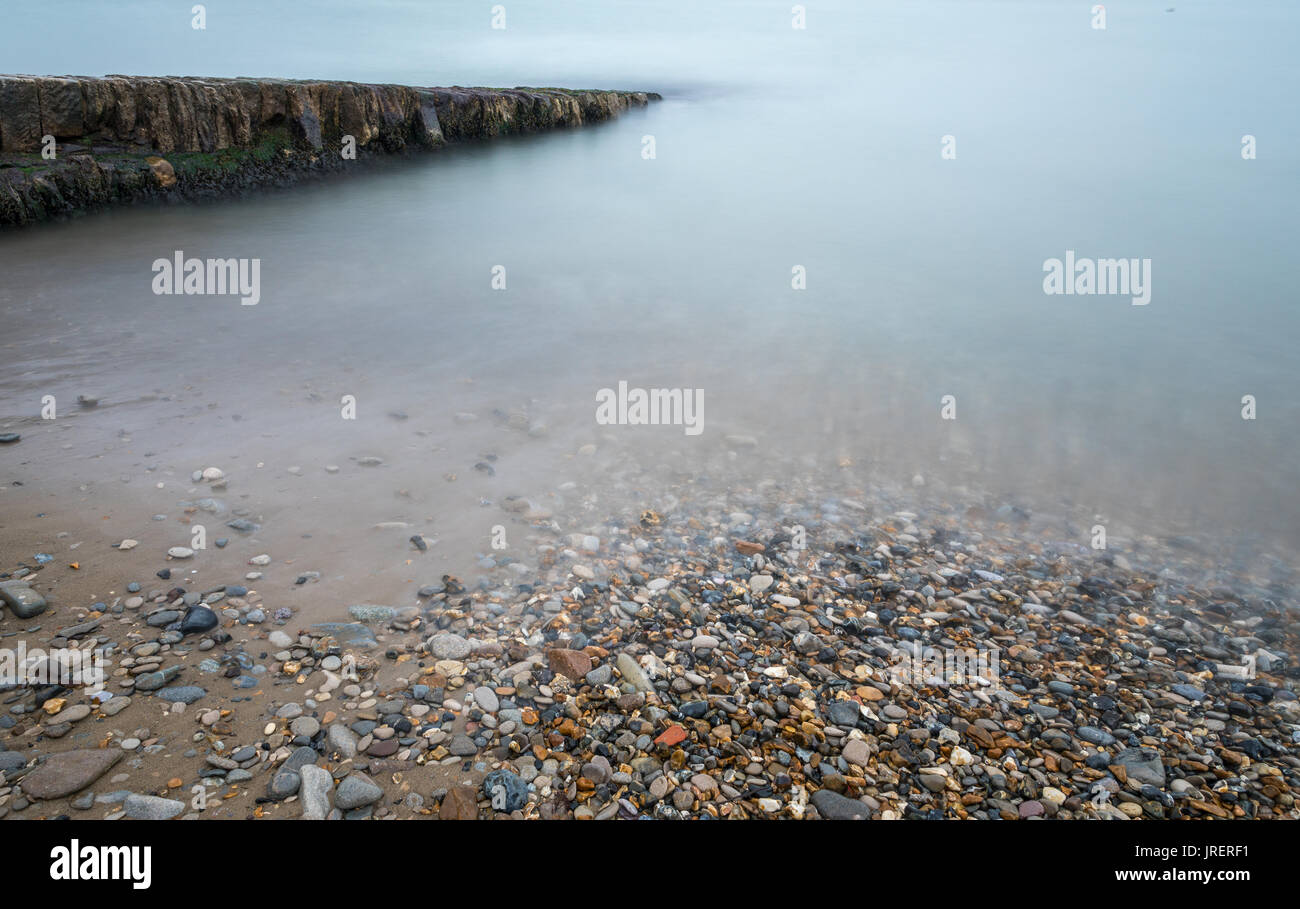slipway into bay on a dull day Stock Photo - Alamy