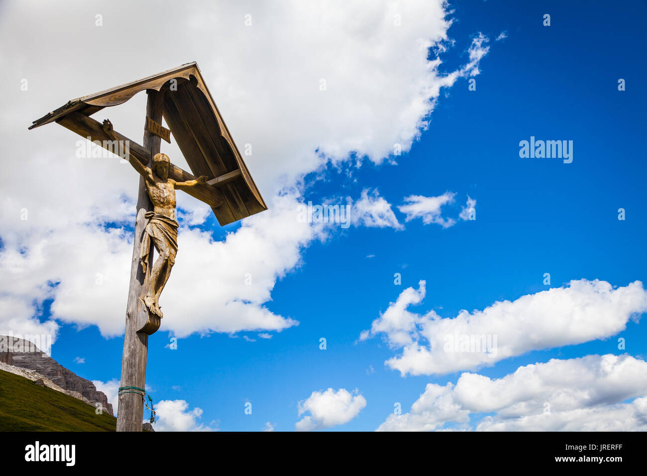 A 100 years old Crucifix, made of wood, tipical of Dolomity Region in ...