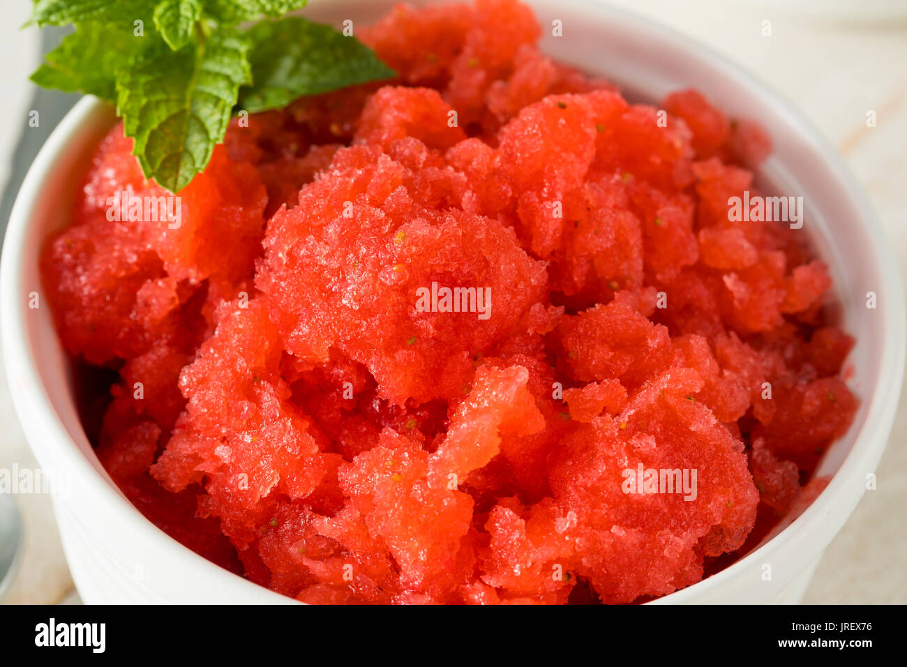 Homemade Italian Strawberry Granita Ice Cream with Mint Stock Photo - Alamy