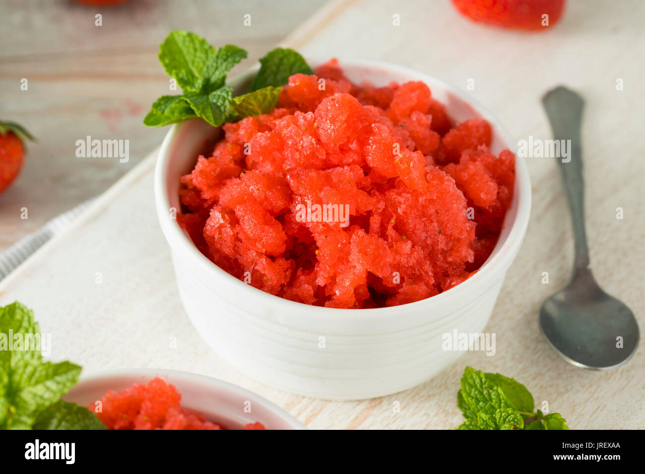 Homemade Italian Strawberry Granita Ice Cream with Mint Stock Photo - Alamy