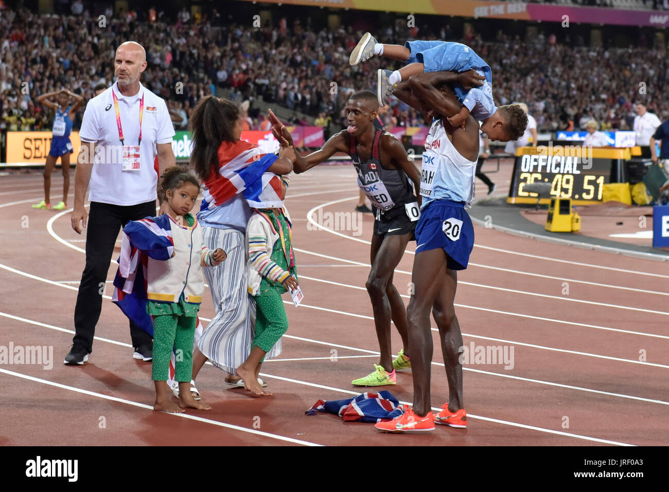 London, UK. 4th Aug, 2017. Mo Farah celebrates with his family as he ...