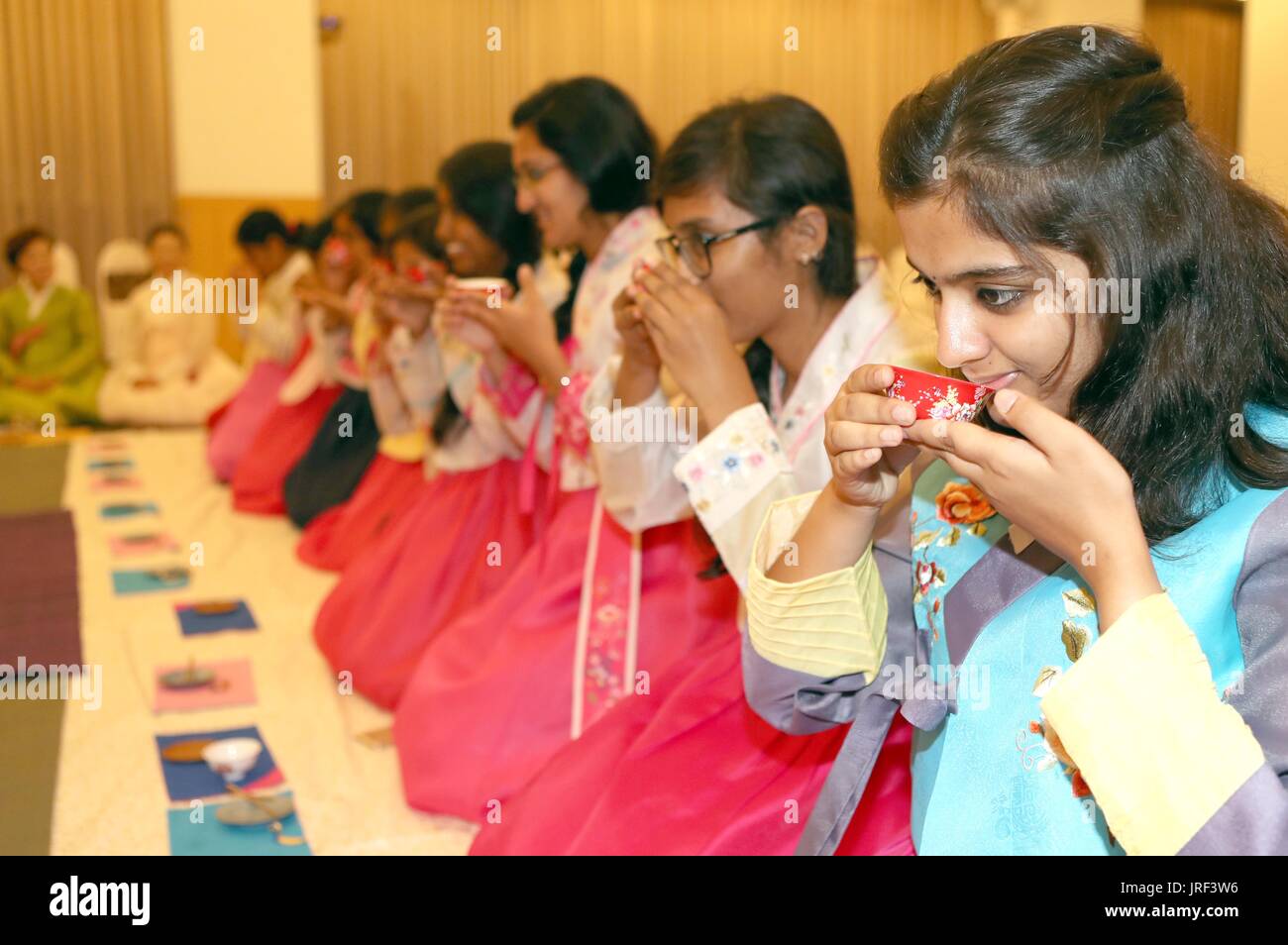 Indian students drinking tea A group of Indian students drink South ...