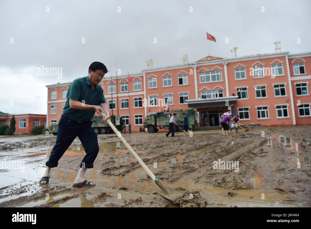 Xiuyan, China's Liaoning Province. 5th Aug, 2017. School staff clean ...