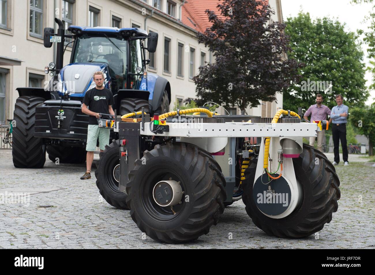 Student Peter Bendix is driving an electric plantation robot on the ...