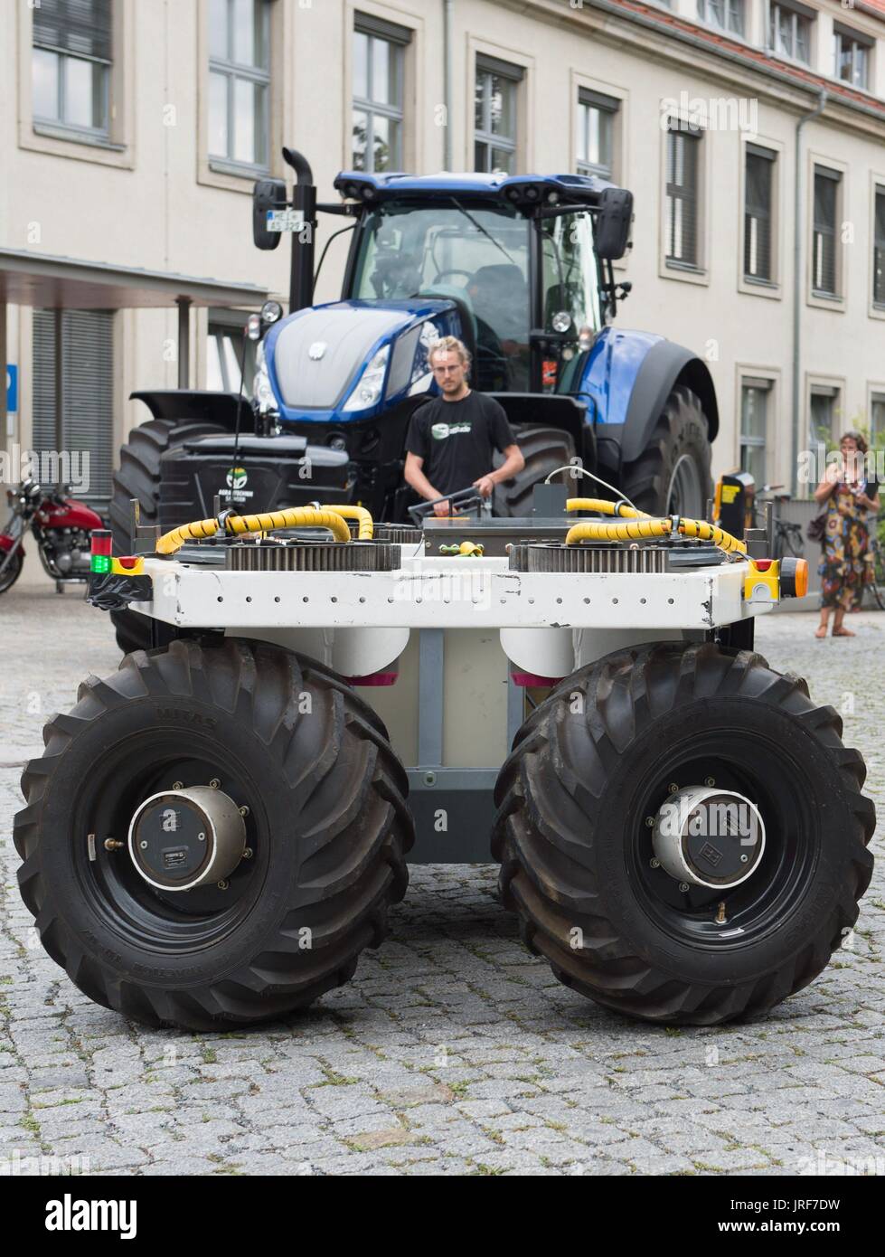 Student Peter Bendix is driving an electric plantation robot on the ...