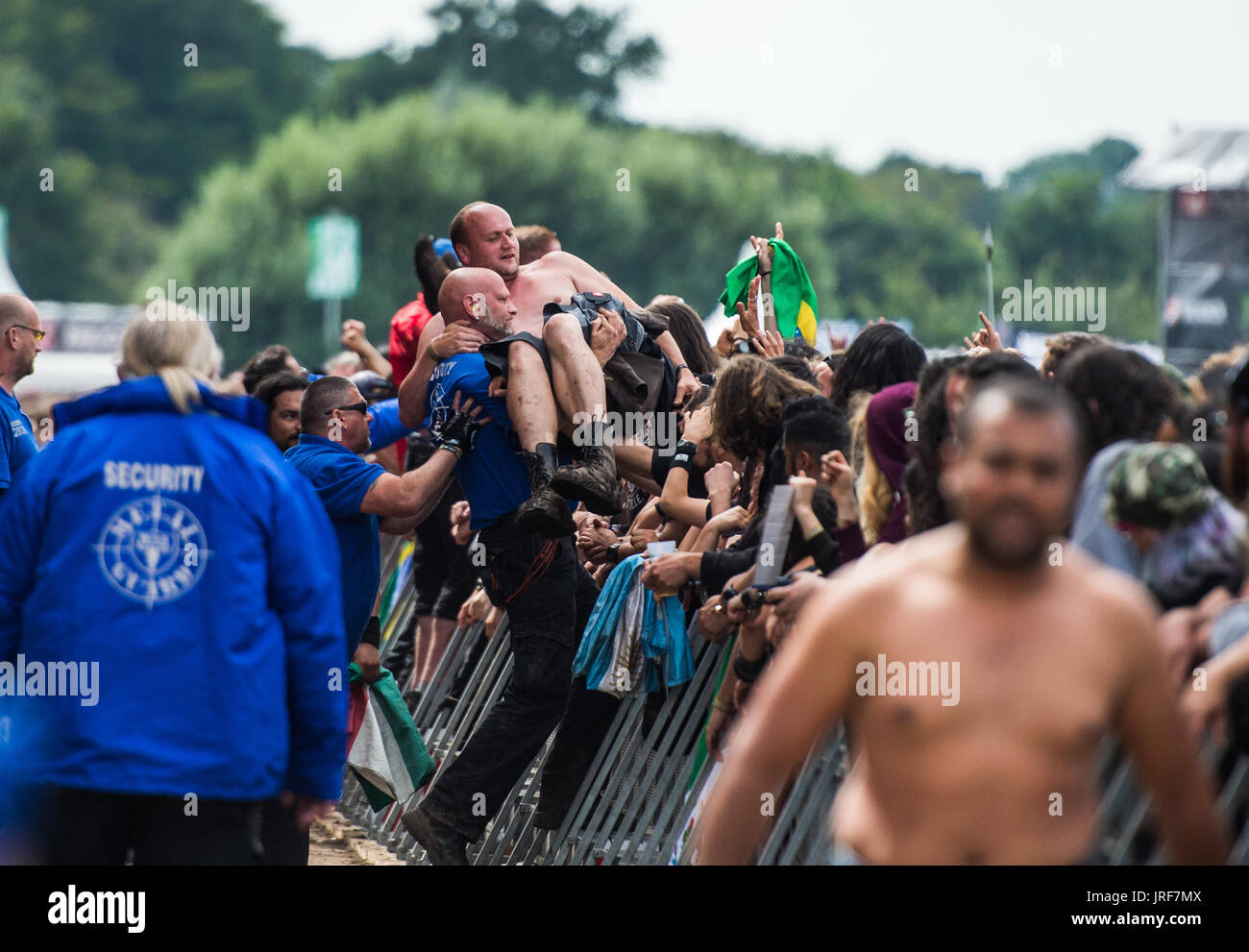 Wacken, Germany. 05th Aug, 2017. Security people carrying a festival ...