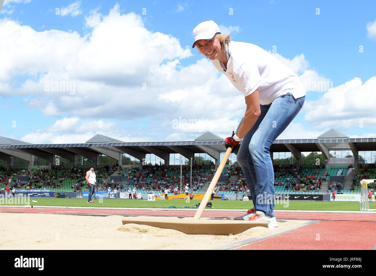 Ulm, Germany. 05th Aug, 2017. Heike Drechsler rakes sand in the long ...
