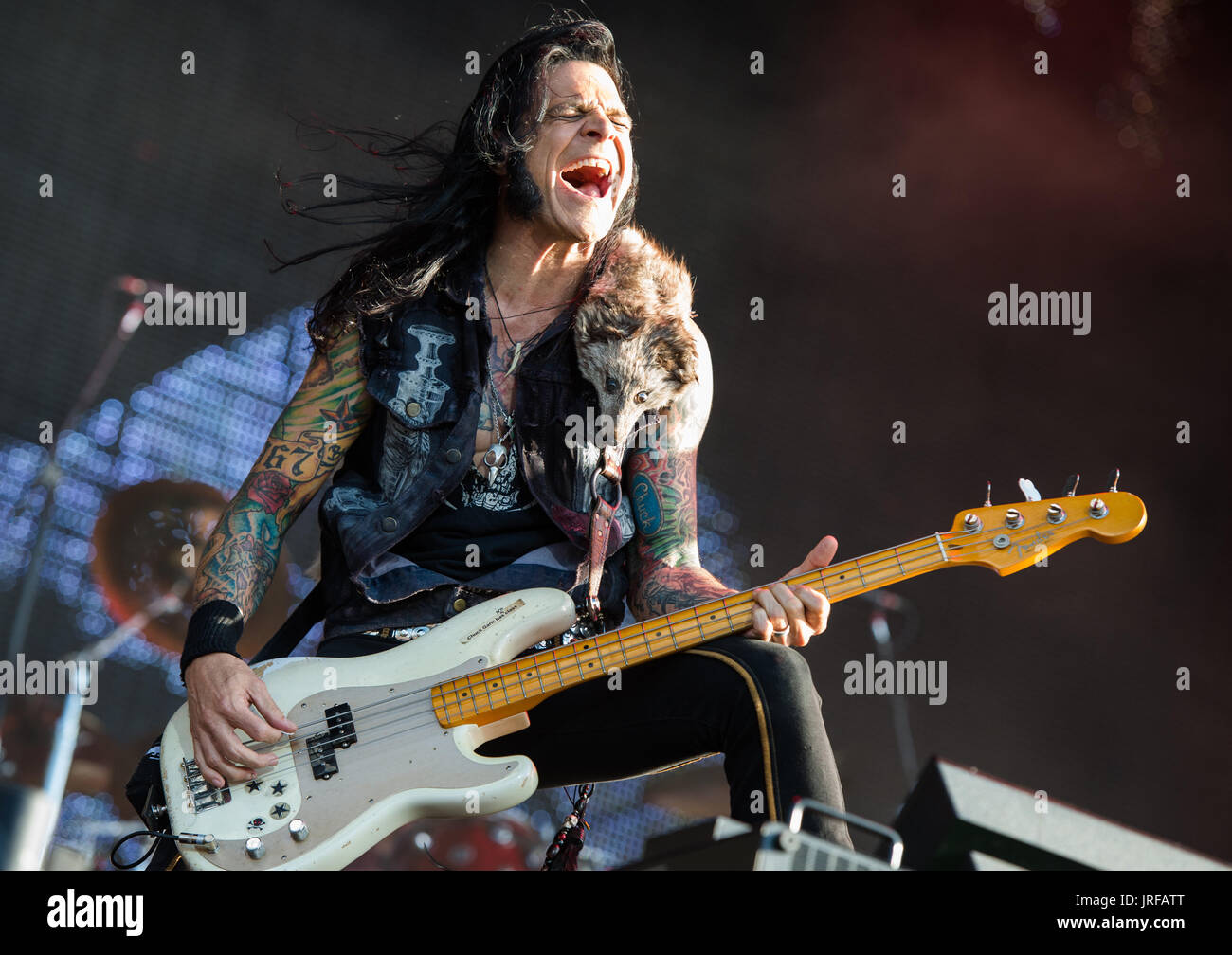 Chuck Garric, bass player of US band "Alice Cooper", performing on the ...