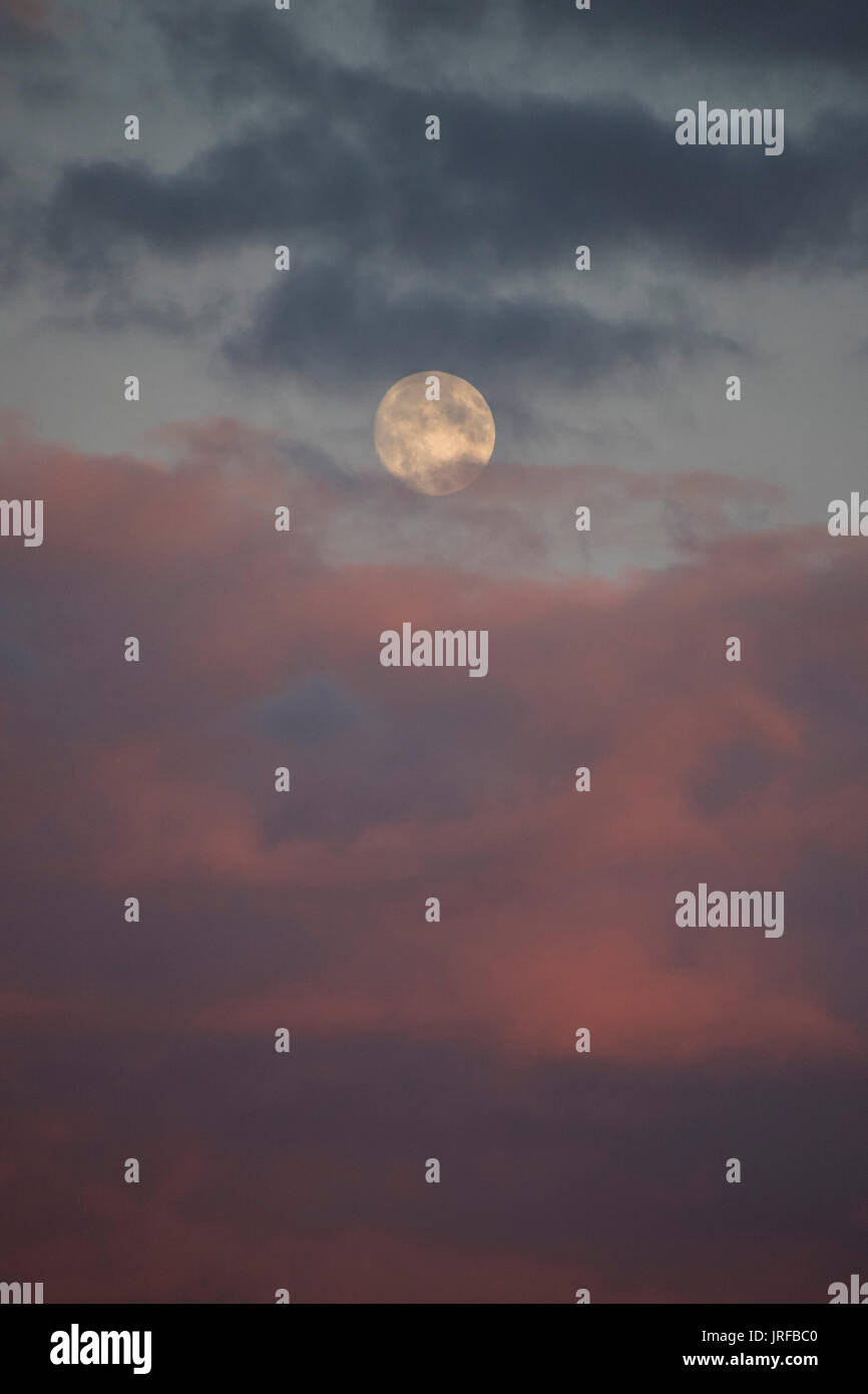 Red full moon setting in hi-res stock photography and images - Alamy