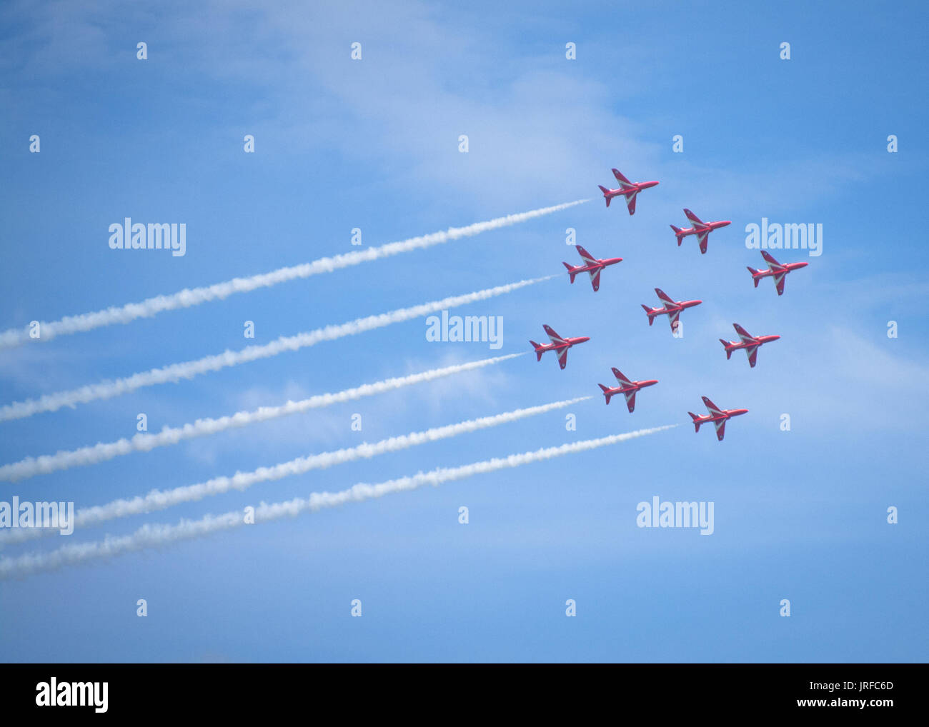 Red Arrows diamond formation with smoke Stock Photo - Alamy