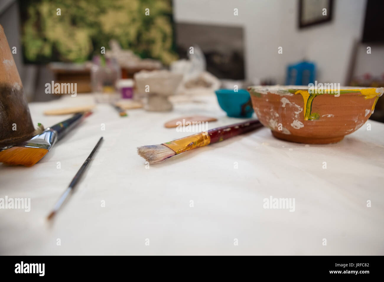 Painting equipment on table in drawing class Stock Photo - Alamy
