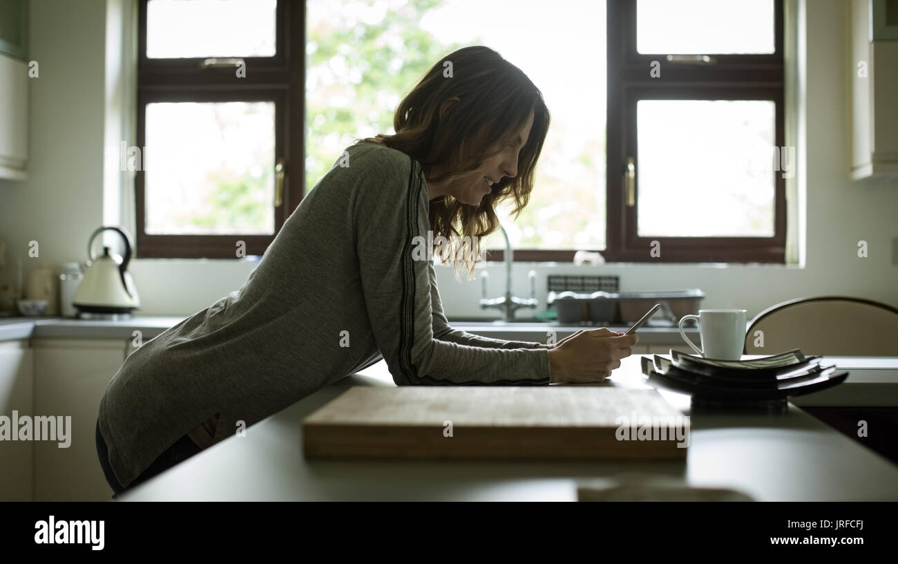 Side view mature woman leaning hi-res stock photography and images - Alamy